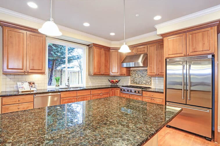 Corian vs Granite Countertops (Design Guide)