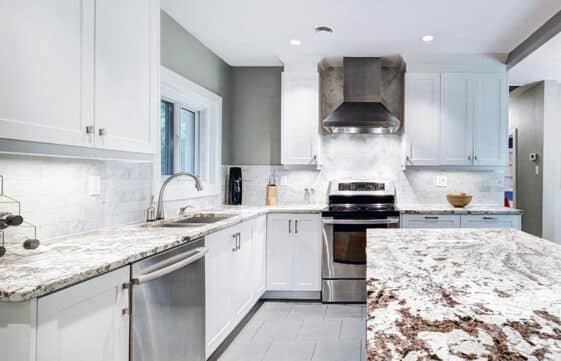 Corian vs Granite Countertops (Design Guide)